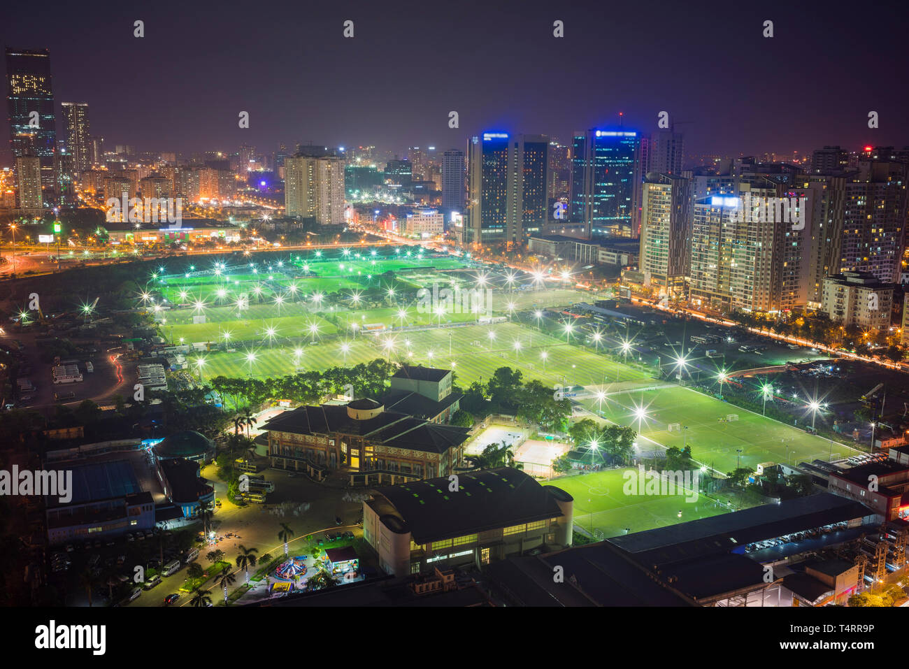 Aerial view of football grounds in Hanoi at night. Cau Giay district ...