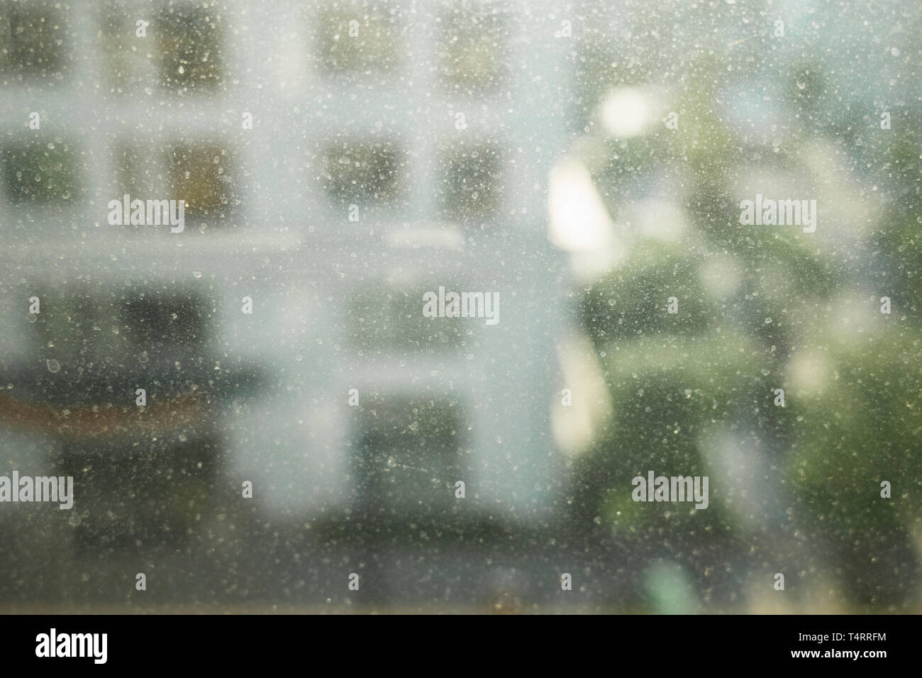 Sandy dirty glass against apartment building on background Stock Photo ...