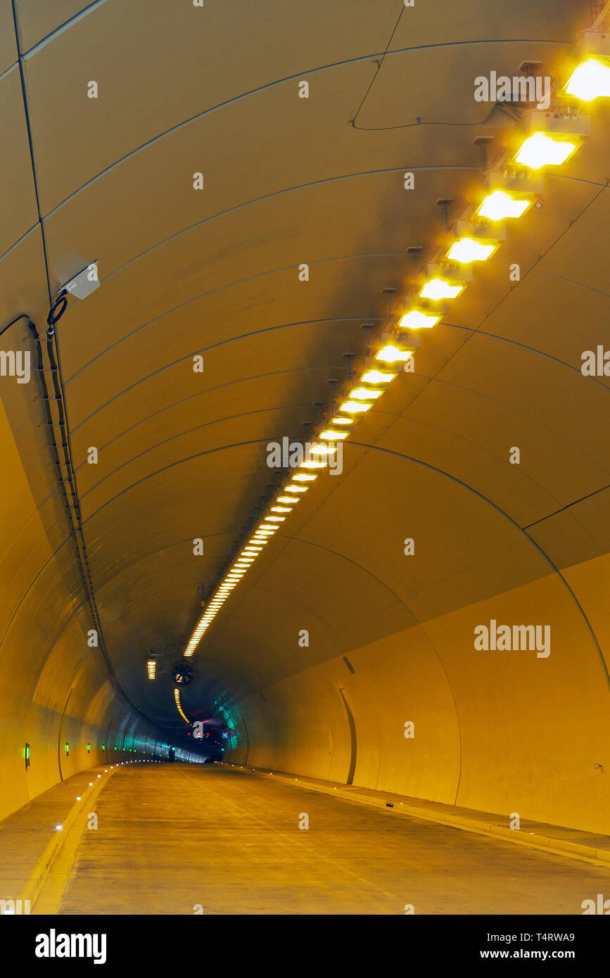 Highway Tunnel with light and signs Stock Photo - Alamy