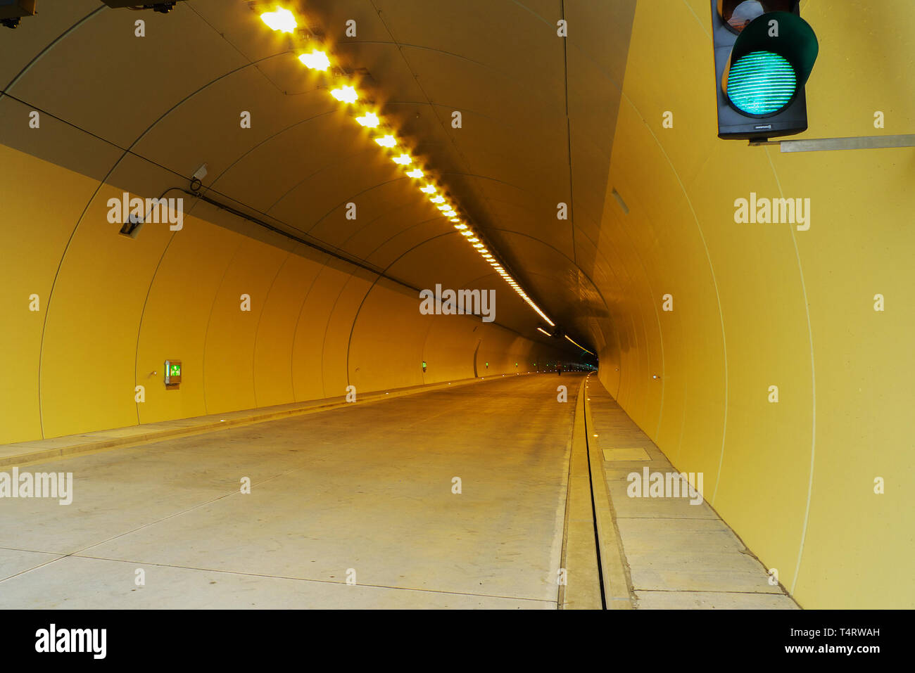 Highway Tunnel with light and signs Stock Photo - Alamy