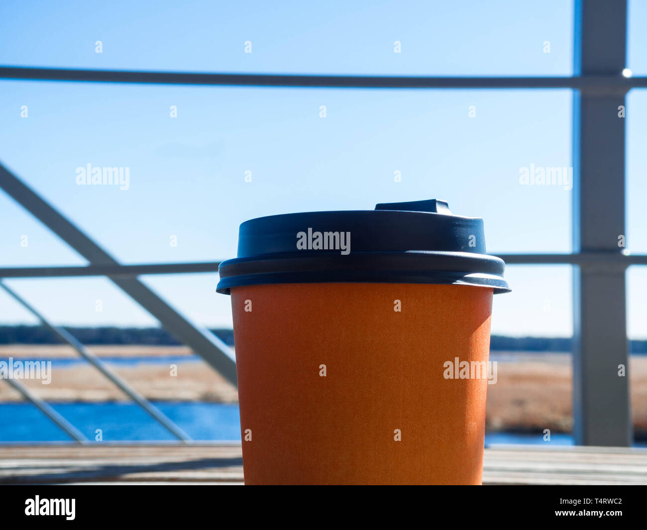 paper cup with lid. Coffe cup on wooden surface. Street coffee, take ...