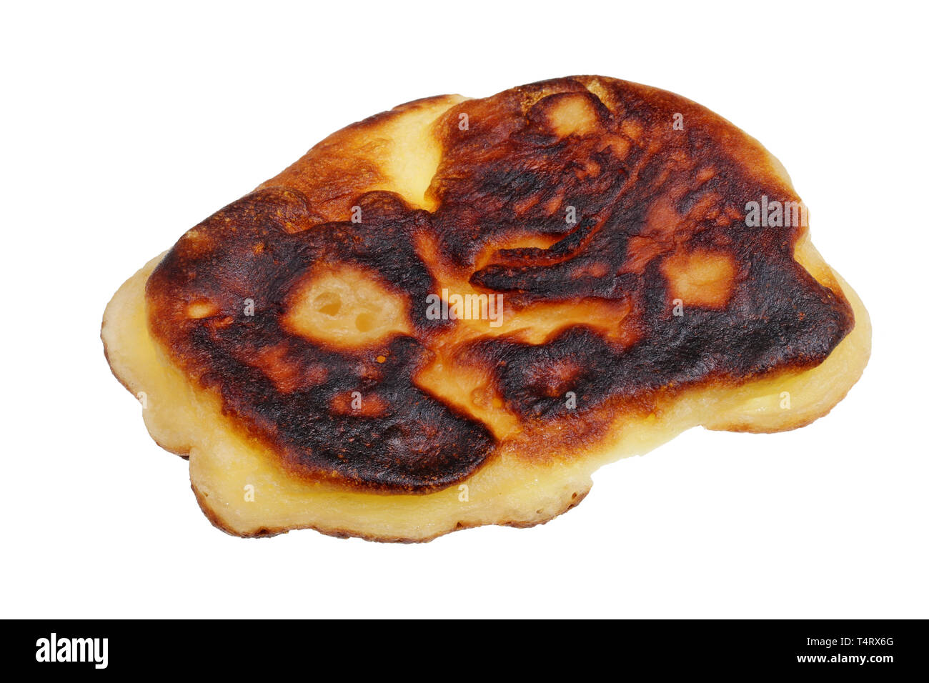 The first ugly burning black pancake concept. Isolated on white studio ...