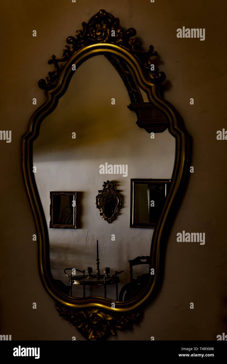 Mirror Image in a Retro Room Stock Photo - Alamy