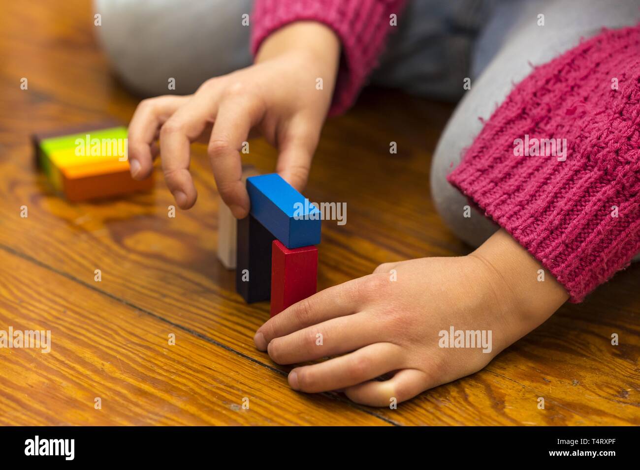 Children playing with blocks hi-res stock photography and images - Alamy