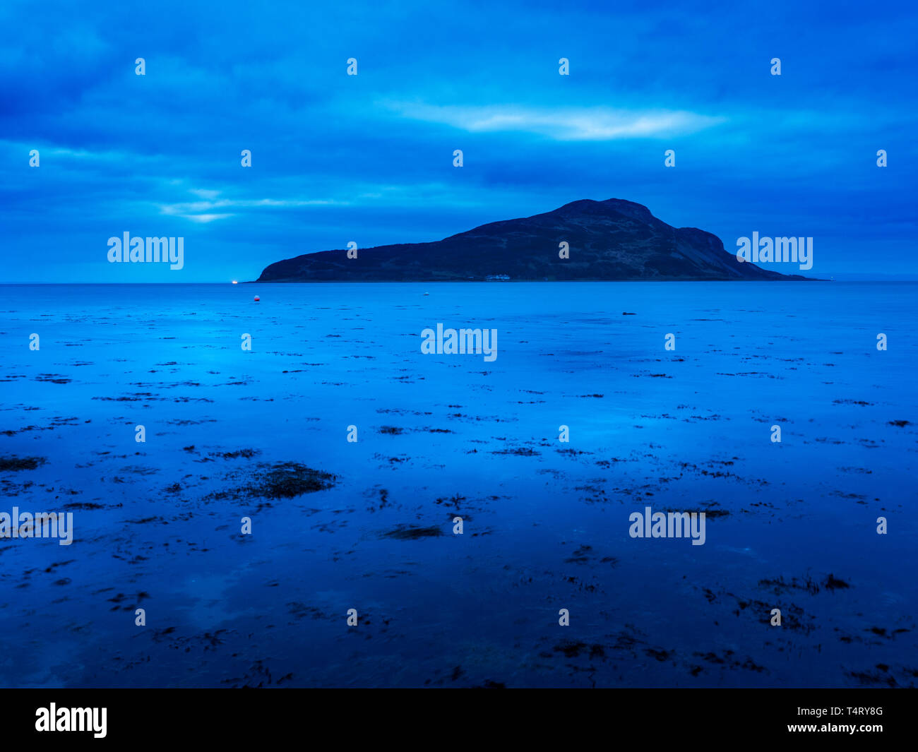 Holy Isle at dawn from Lamlash on the Isle of Arran North Ayrshire ...