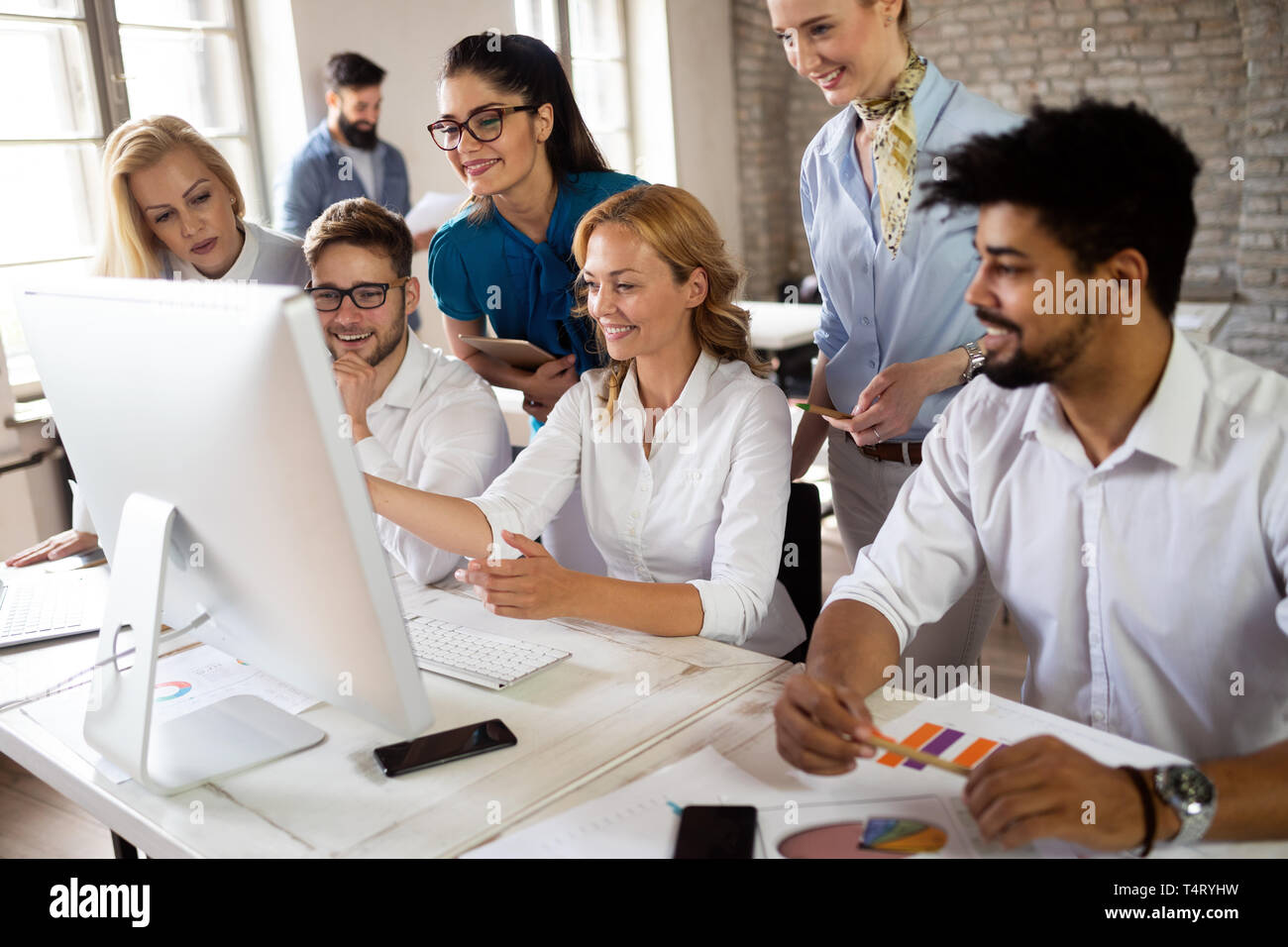 Successful business group working at the office Stock Photo - Alamy
