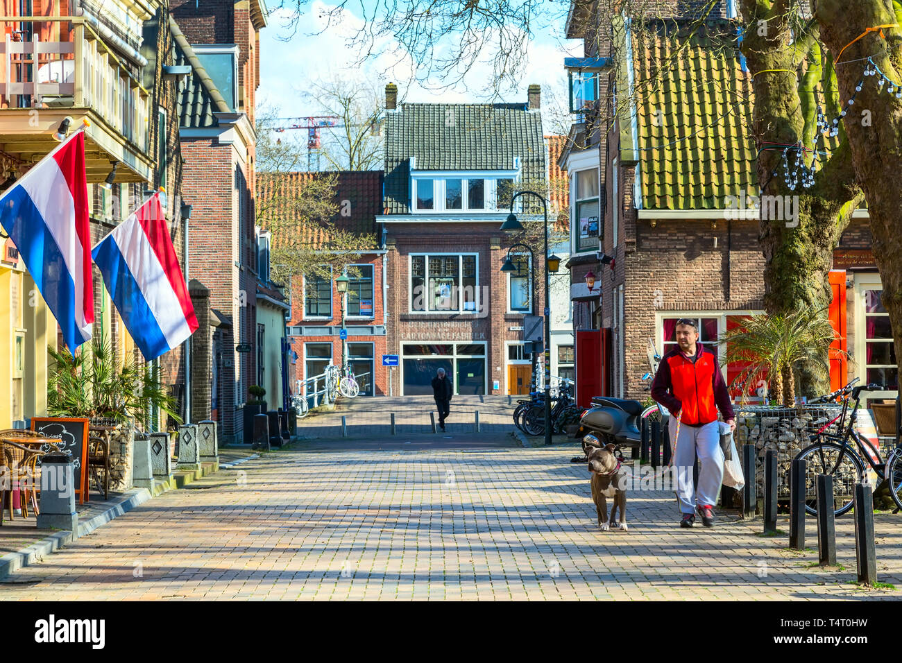 Delft, Netherlands - April 8, 2016: Colorful street view, dutch houses ...