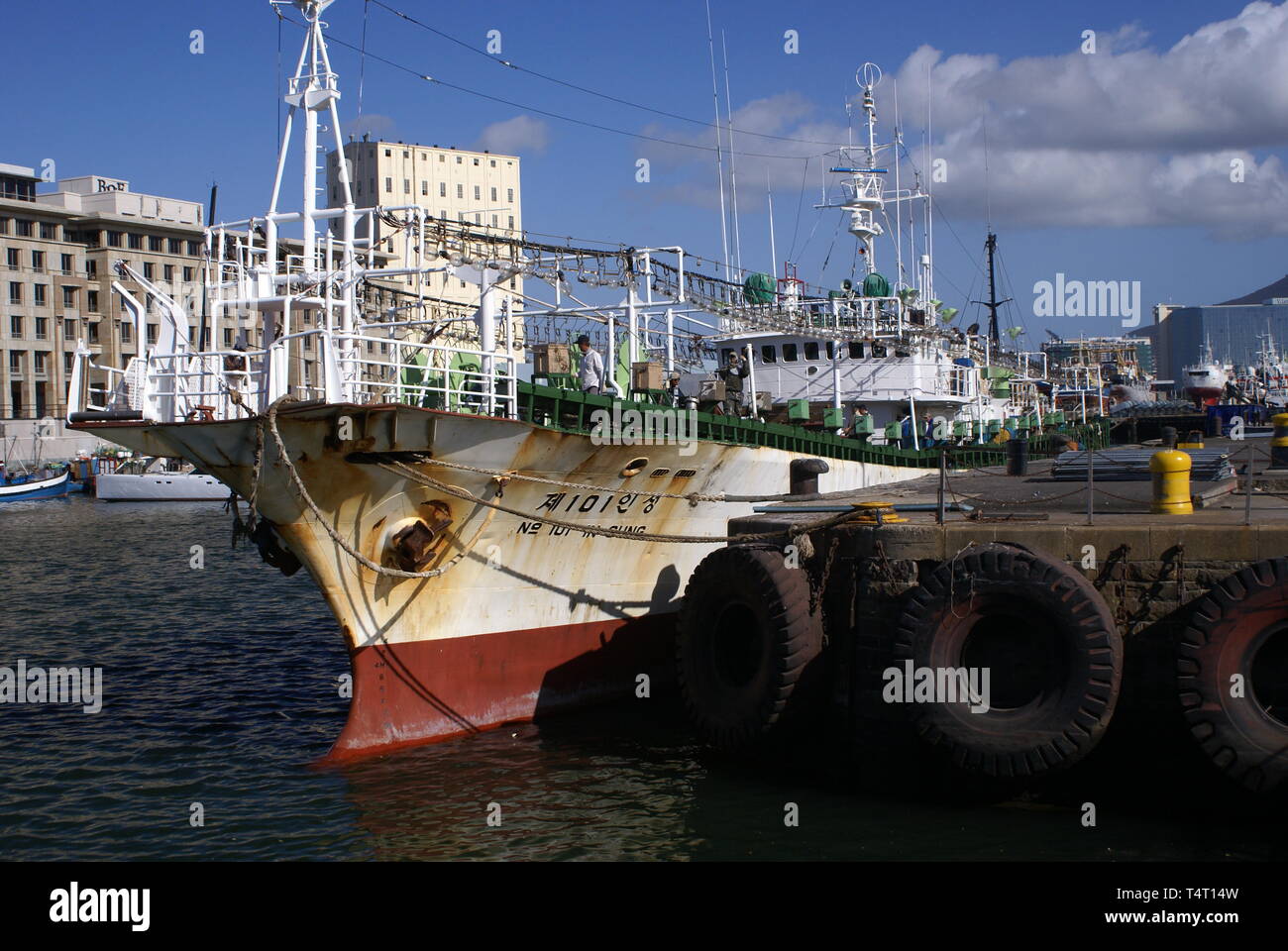 Fishing vessel in the waters of Alfred Basin, Cape Town port of South ...