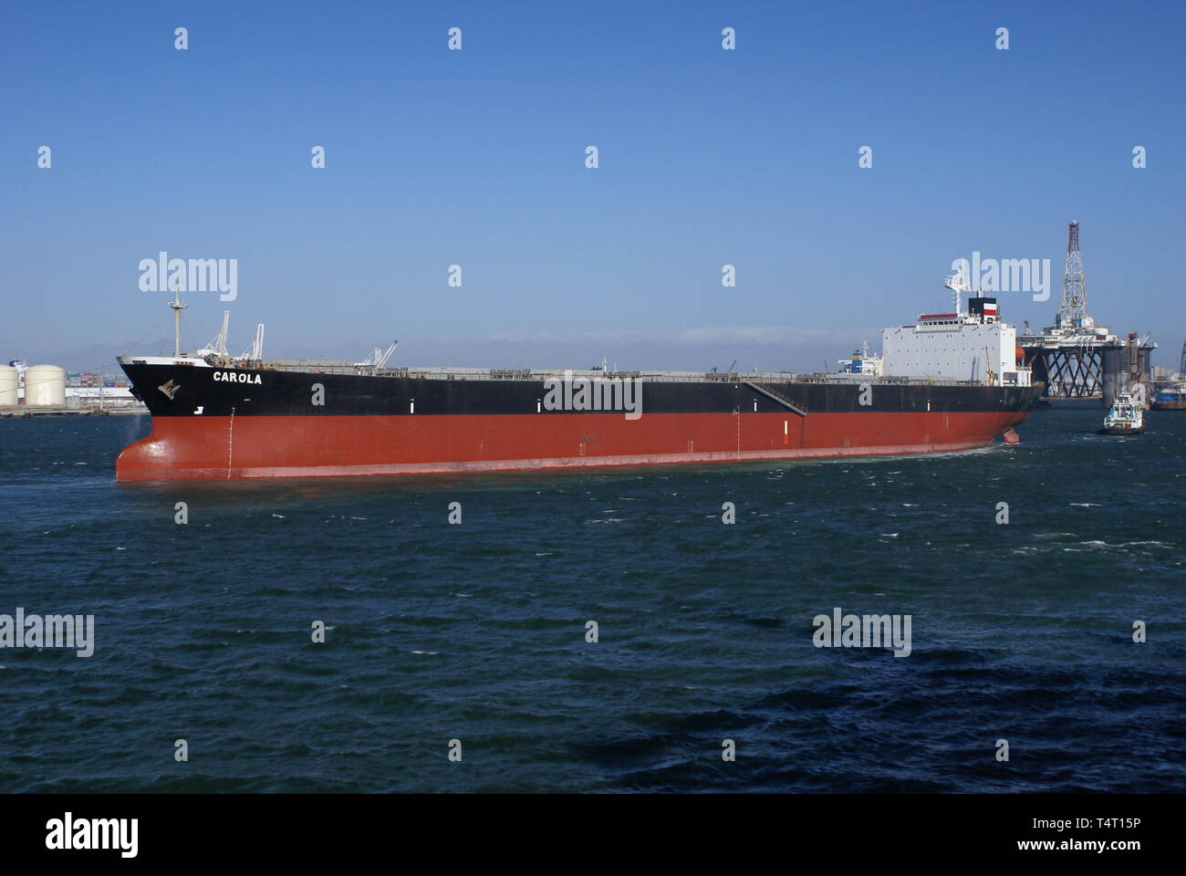 A bulk carrier Carola in the waters of Duncan Dock, port of Cape Town ...