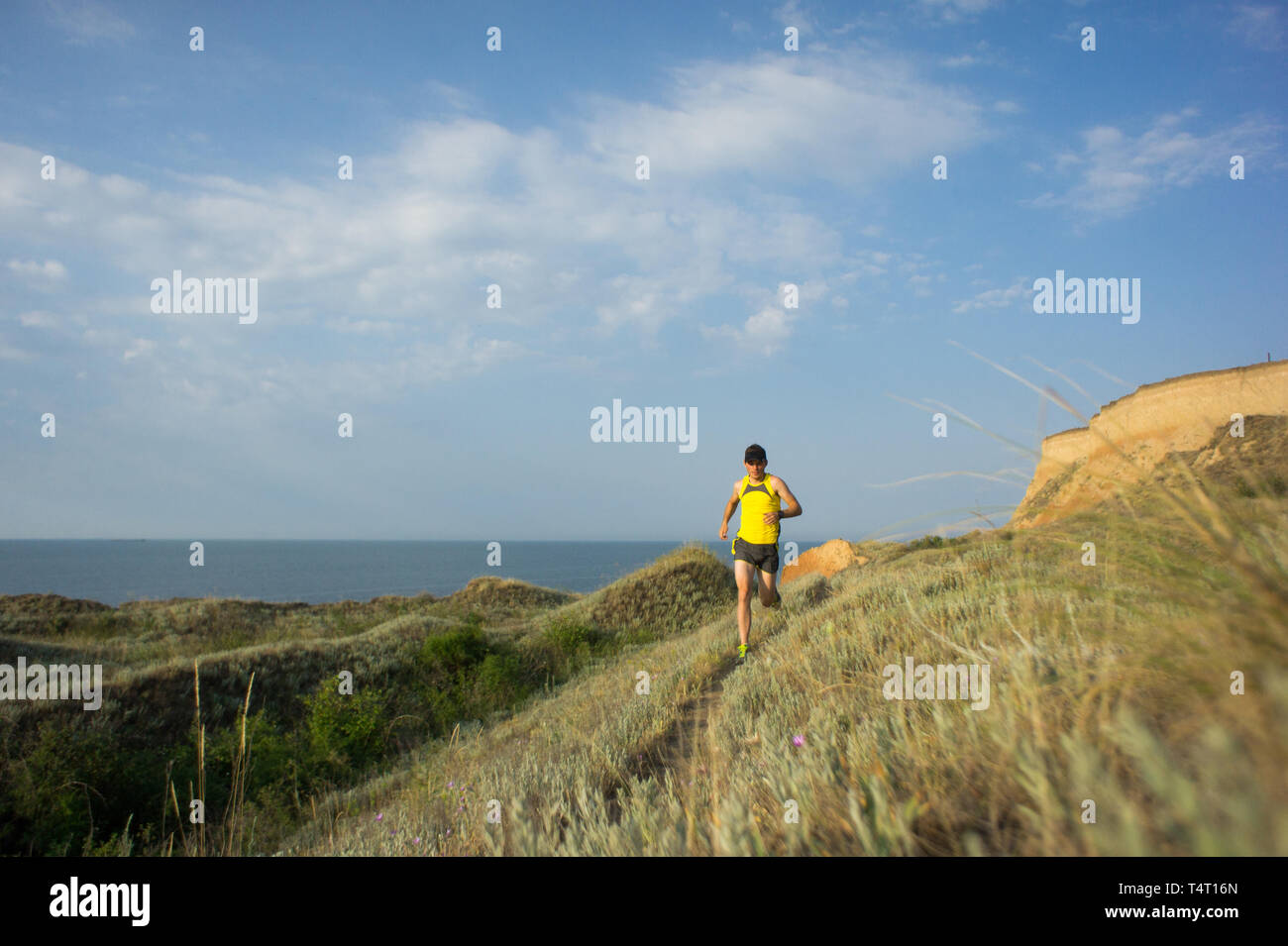 Running jumping athlete hi-res stock photography and images - Alamy