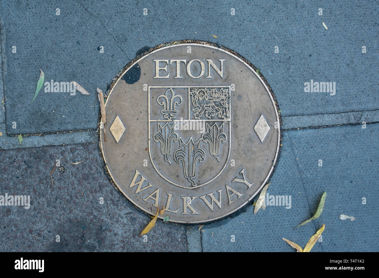 An Eton Walkway marker in the pavement in Eton, just across the River ...