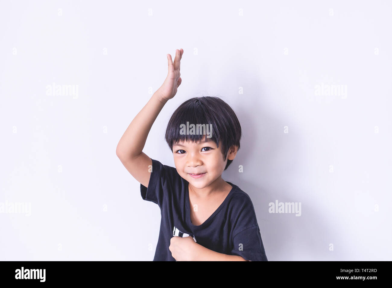 Child raise hand school hi-res stock photography and images - Alamy