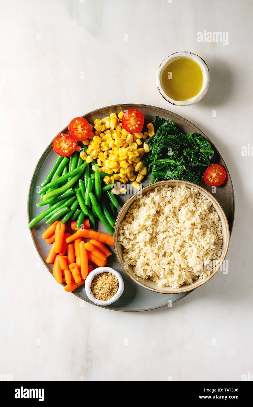 Couscous with parboiled vegetables baby carrots, green beans, sweet ...
