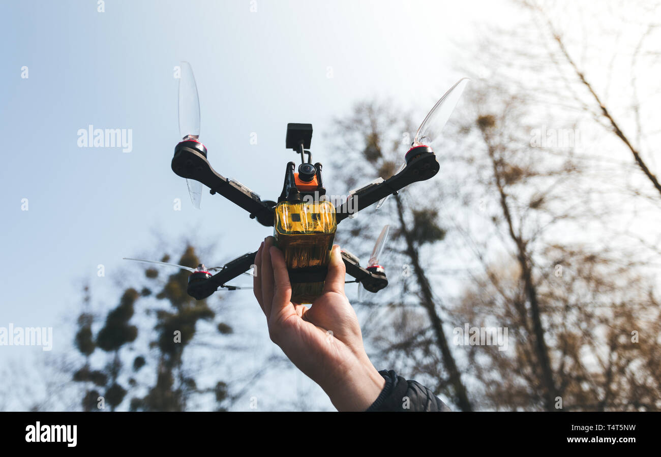 Man holds in his hand fpv copter Stock Photo - Alamy