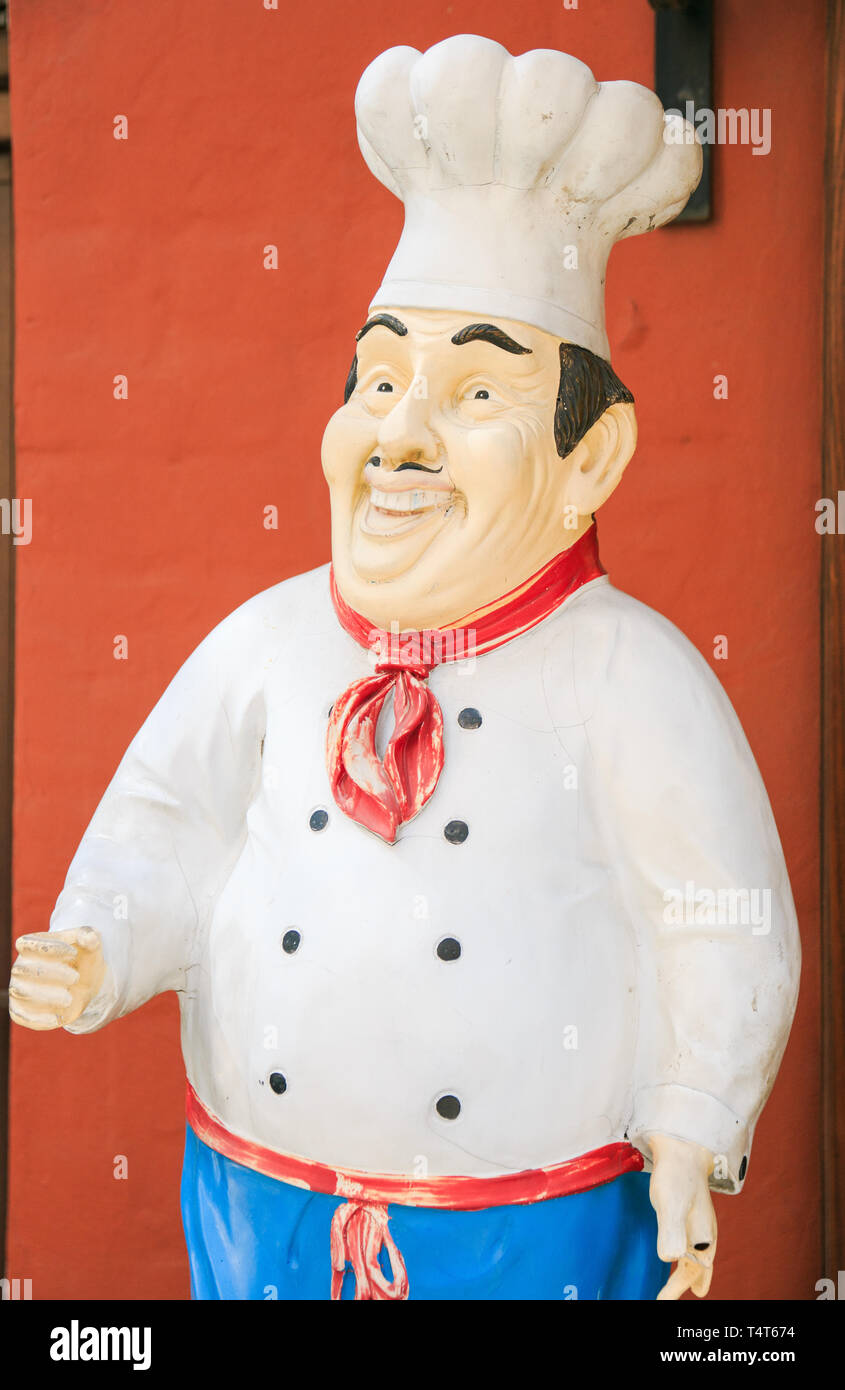 decorative chef dressed in typical chef clothes Stock Photo - Alamy