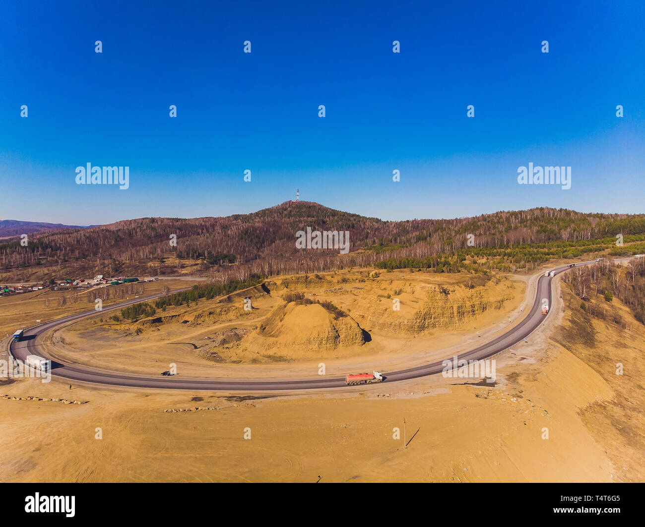 Desert road - Aerial image of traffic going up and down a serpentine ...