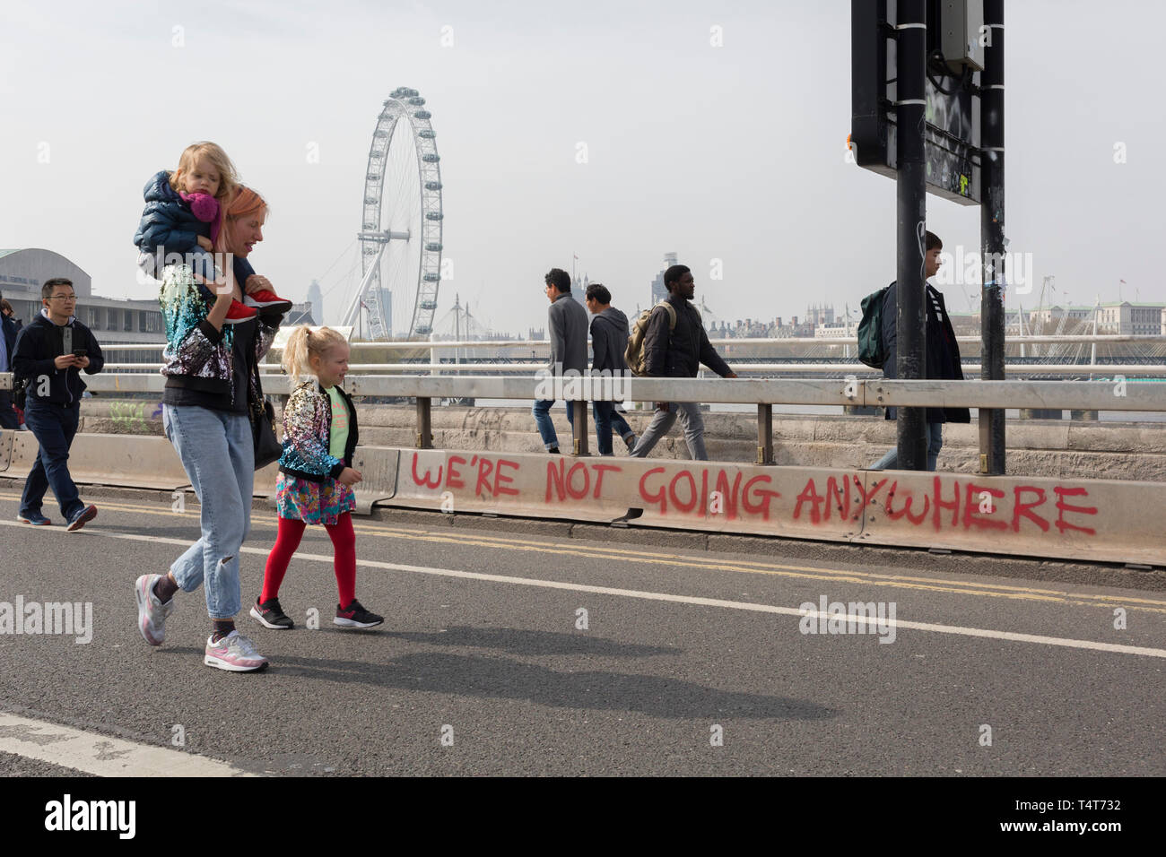 Commuters and visitors walk across the closed Waterloo Bridge on day 4 ...