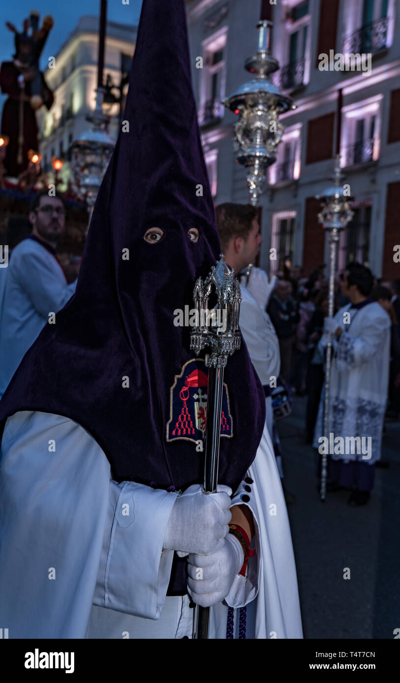 Catholics wearing capirotes, cloaks and hoods, belonging to the ...