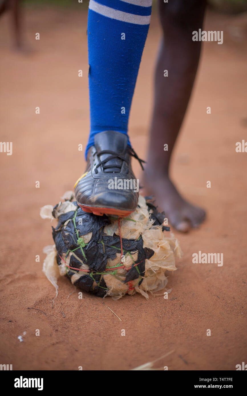 Football boot and a ball Stock Photo - Alamy