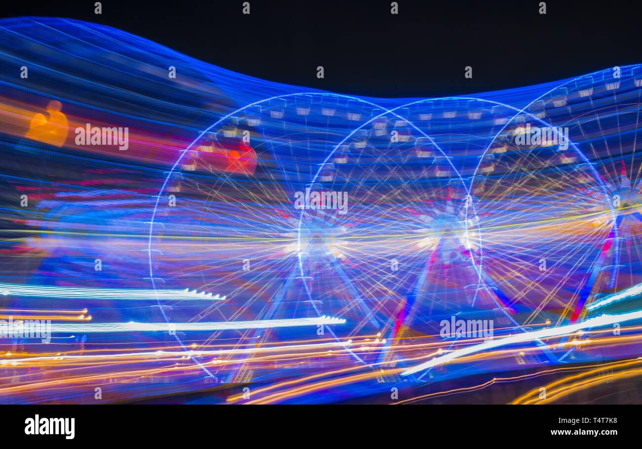 Moving Ferris Wheel in Long Exposure Stock Photo - Alamy
