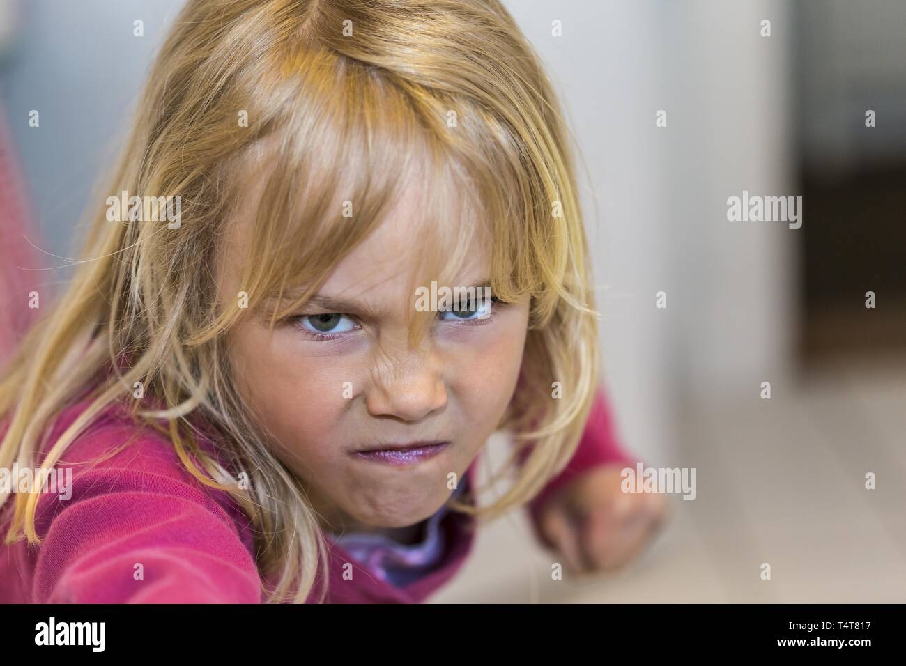 Girl (6) looks grim Stock Photo - Alamy