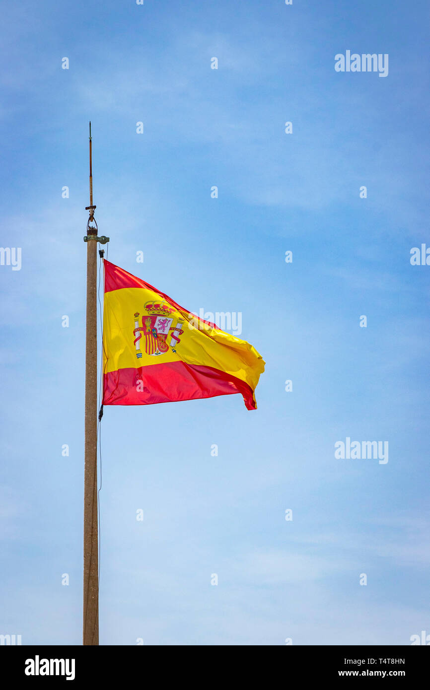 Spanish flag flying against blue sky above Santa Barbara Castle ...