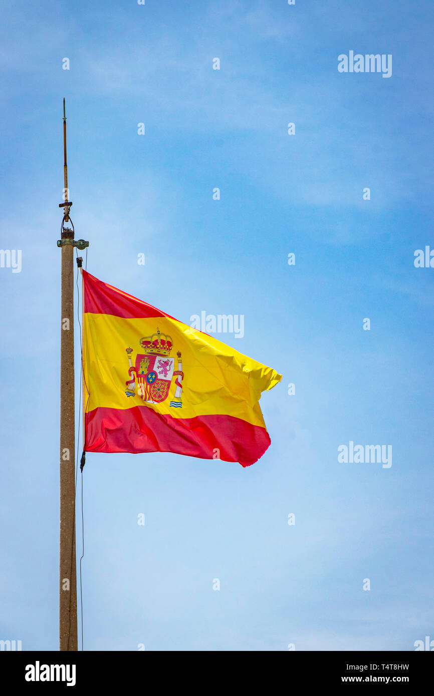 Spanish flag flying against blue sky above Santa Barbara Castle ...