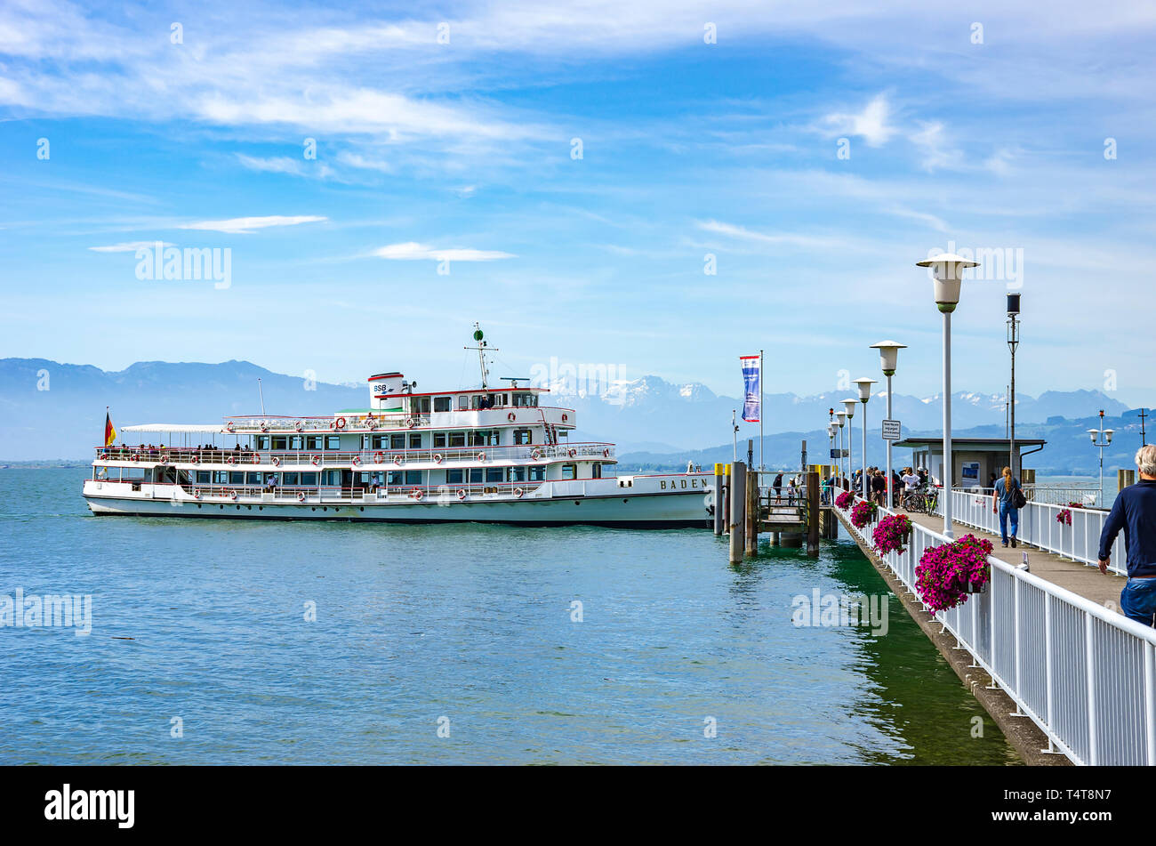 The excursion ship BADEN is docking at the landing stage of Wasserburg ...