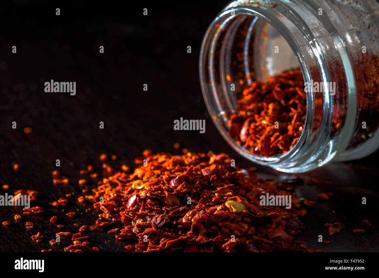 Red chili pepper flakes hi-res stock photography and images - Alamy
