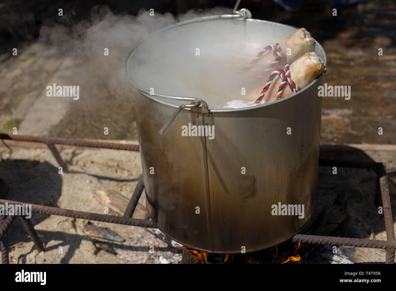 Shoulder of pork is boiling Stock Photo - Alamy