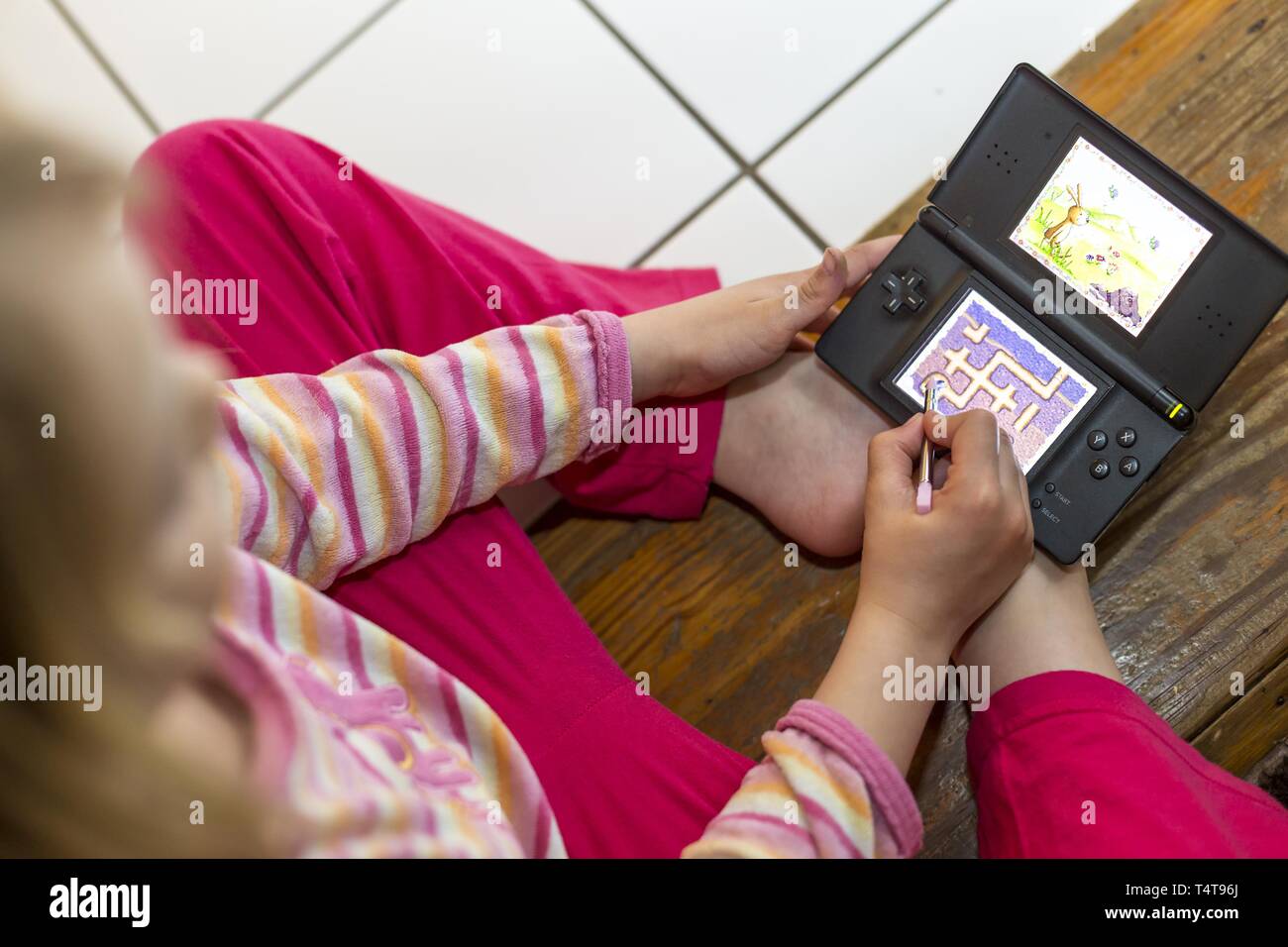 Playing nintendo hi-res stock photography and images - Alamy