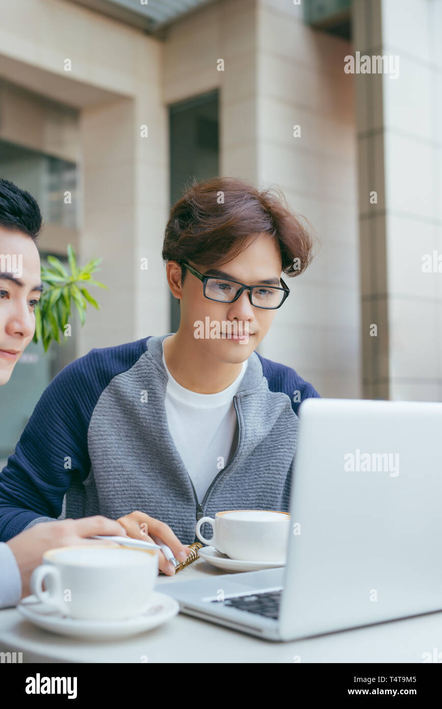 Businessmen chatting in office hi-res stock photography and images - Alamy
