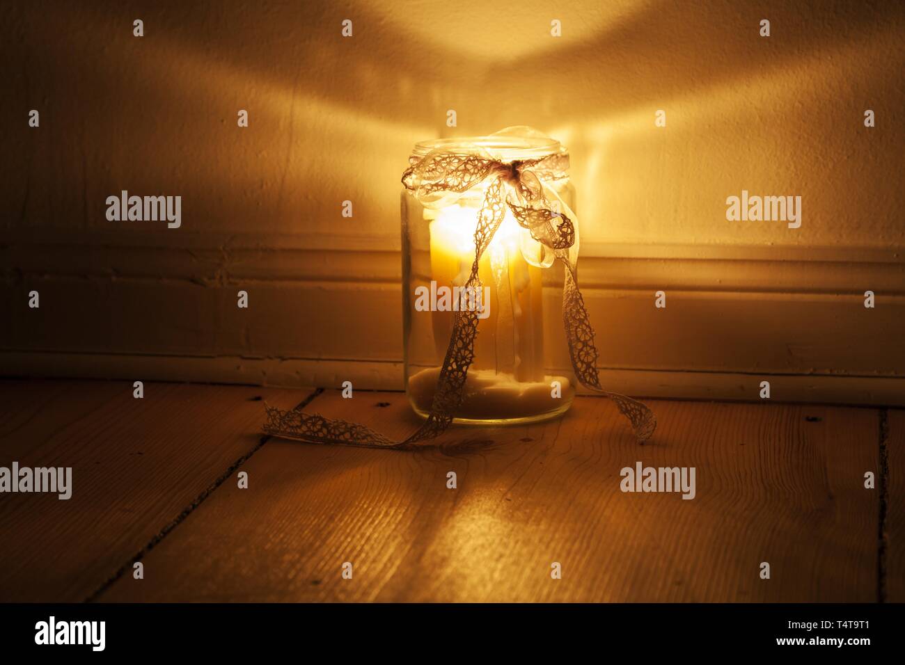 Candle in a glass Stock Photo - Alamy