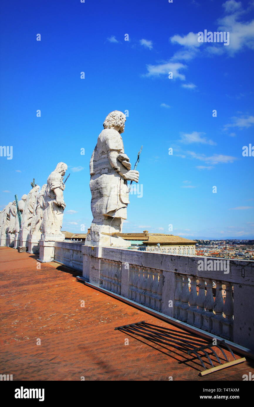 Statues on the top of st peters basilica hi-res stock photography and ...