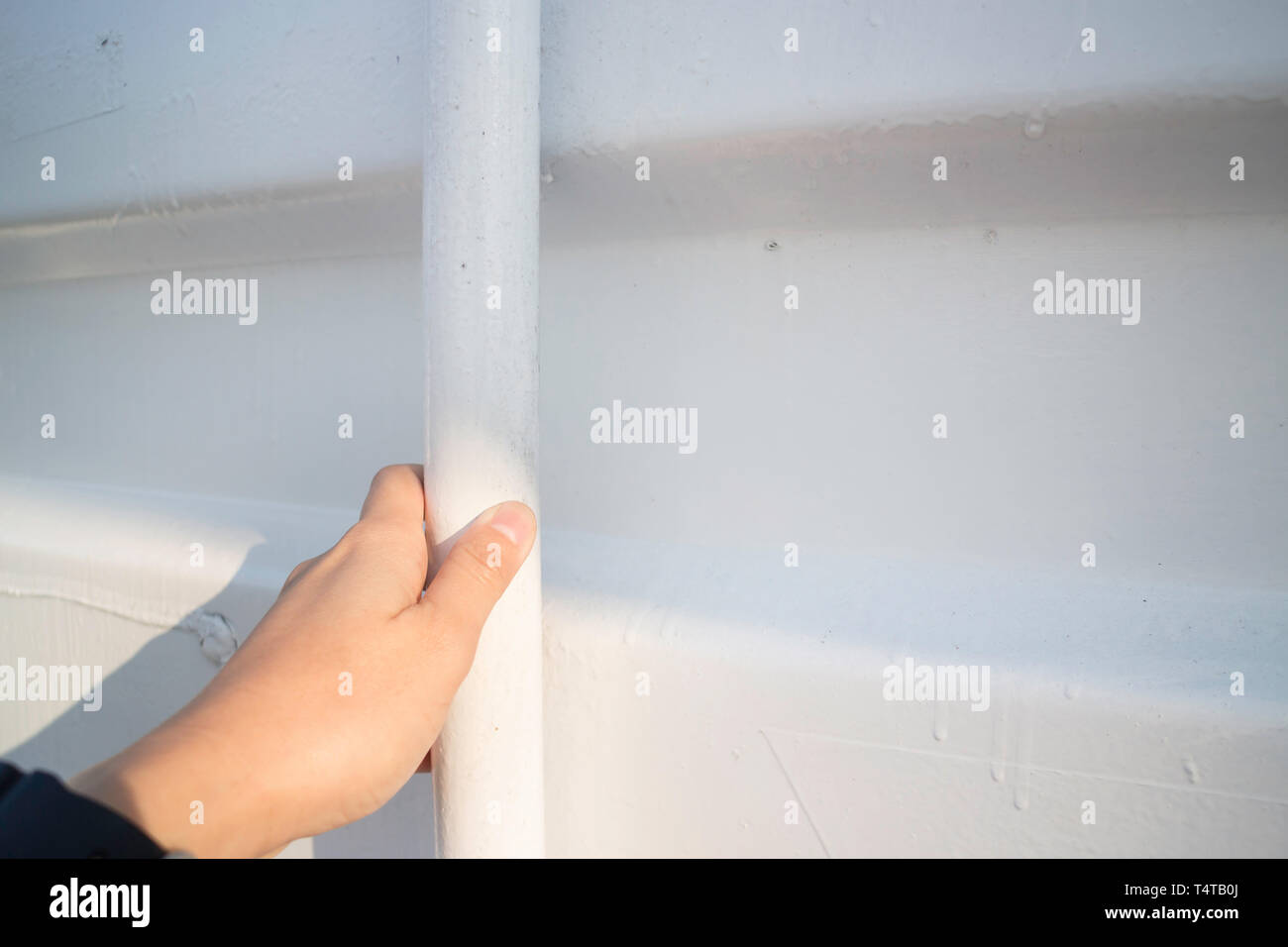 Hand on cargo container door, stock photo Stock Photo - Alamy