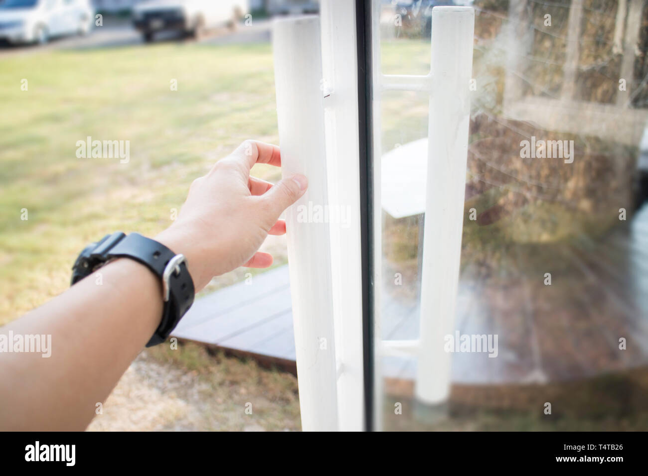 Hand on cargo container door, stock photo Stock Photo - Alamy