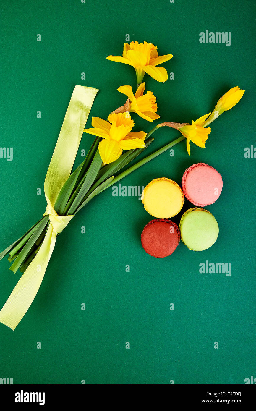 French delicacy, macaroons colorful with spring blossom. Bouquet ...