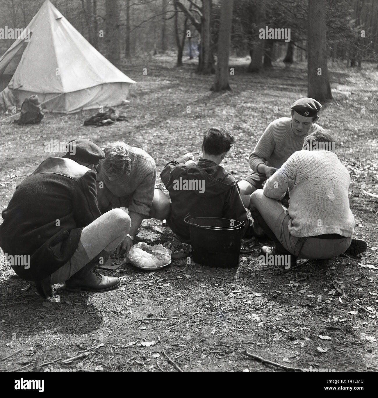 1960s, historical, adventure scouts in the forest at an outdoor ...