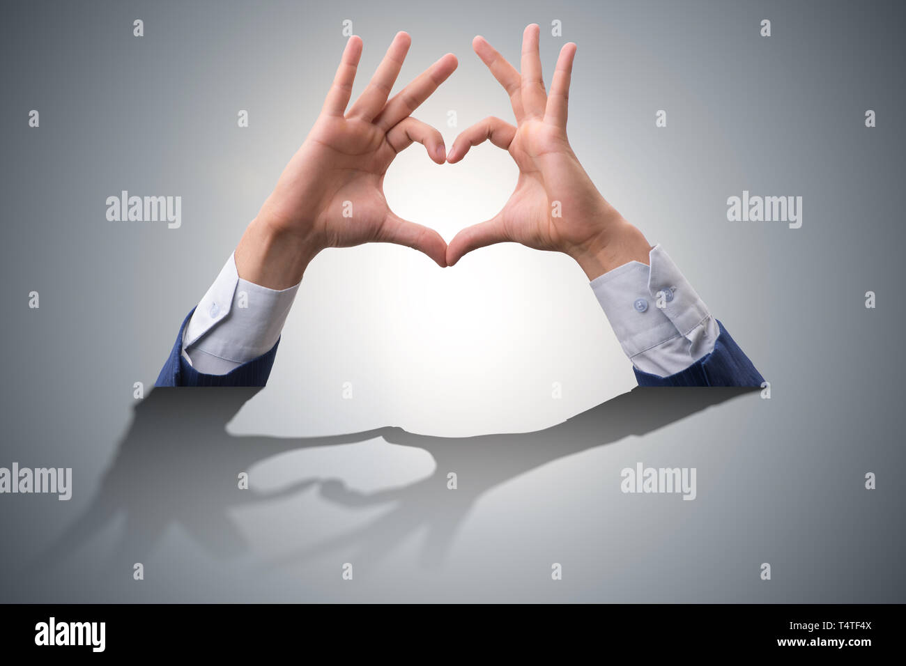 Hands showing heart gesture in love concept Stock Photo - Alamy