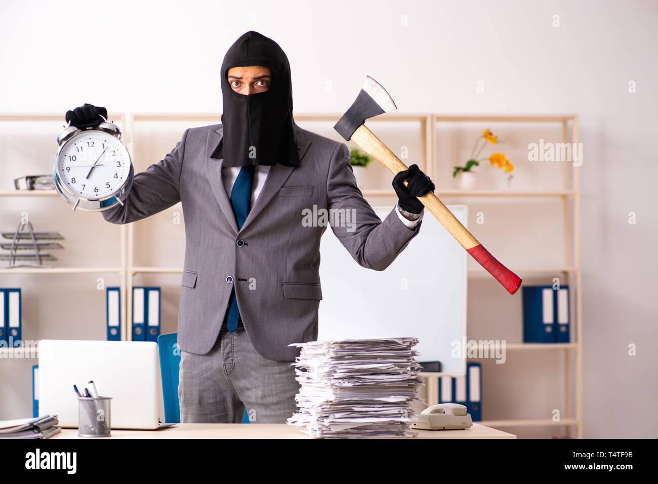 Male gangster stealing information from the office Stock Photo - Alamy