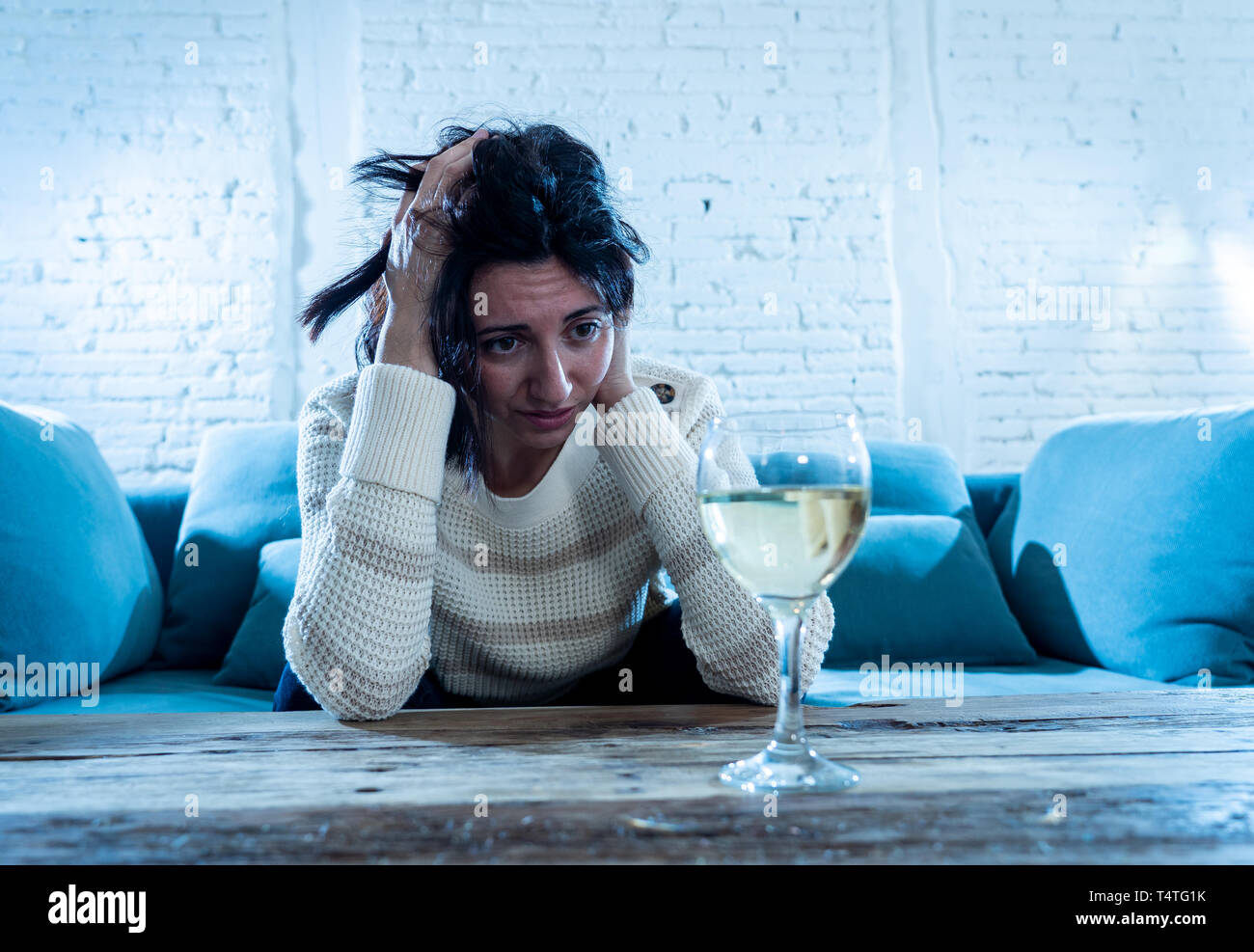 Stressed woman drinking hi-res stock photography and images - Alamy