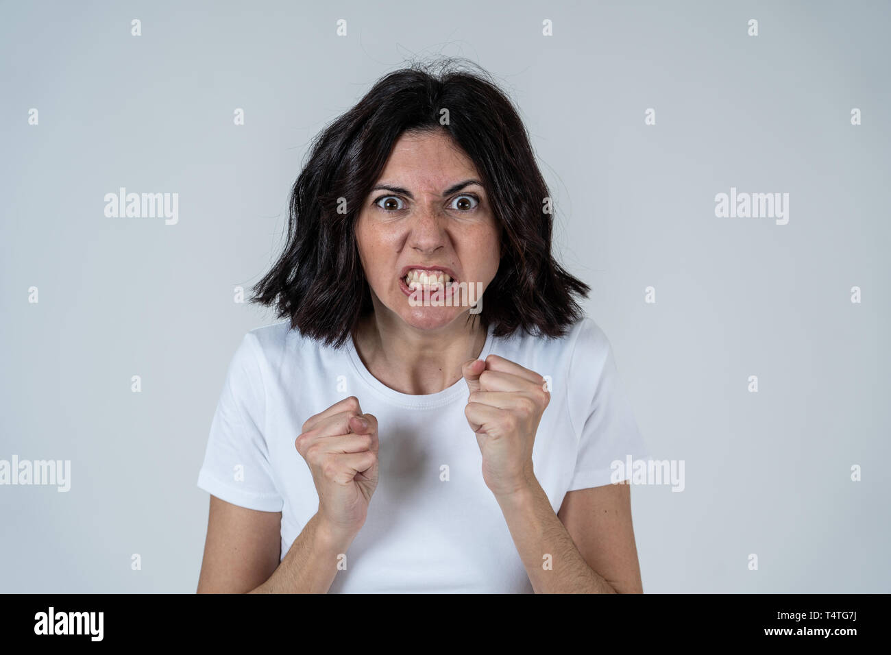 Close up of young frustrated caucasian woman with angry and stressed ...