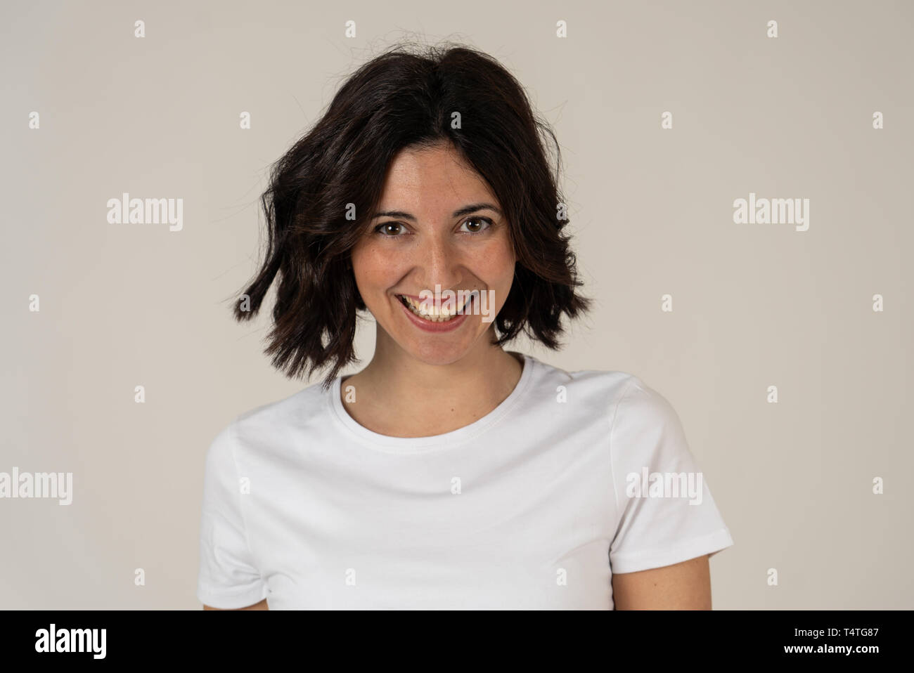 Close up portrait of young pretty caucasian woman with happy face and ...