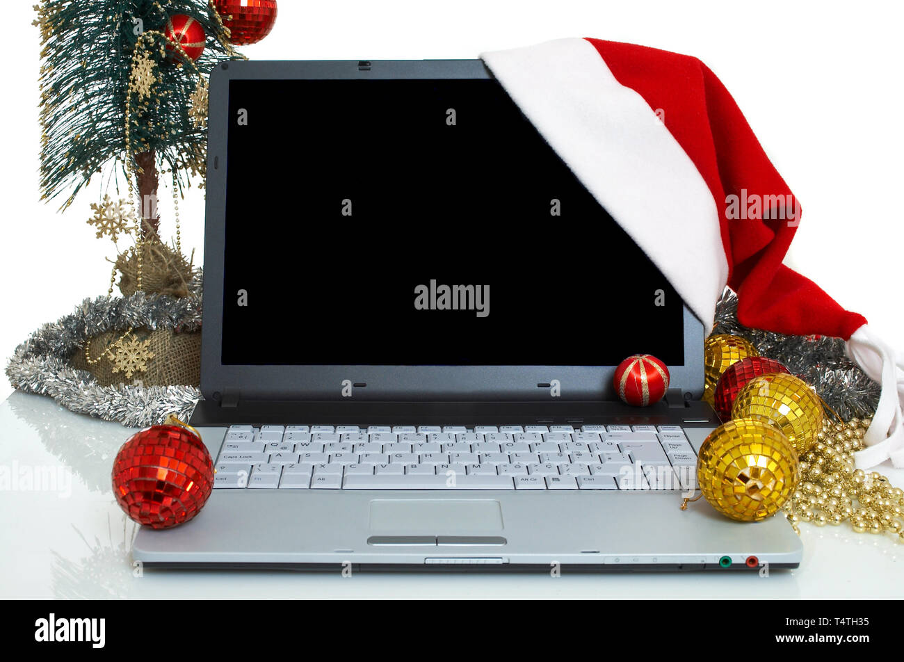 laptop as a christmas present, on white background Stock Photo - Alamy