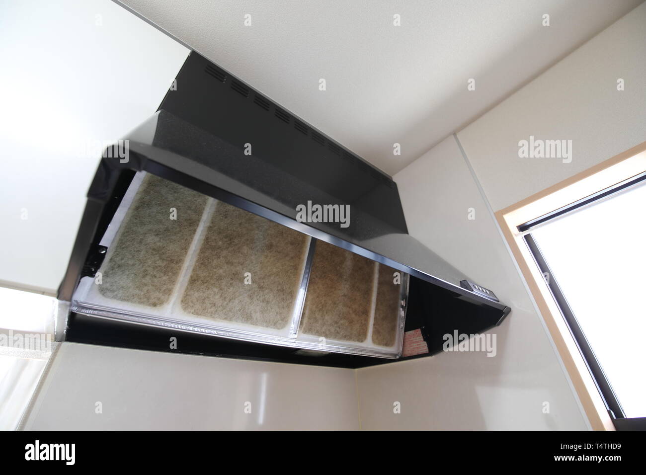 dirty ventilation fan in kitchen interior Stock Photo - Alamy