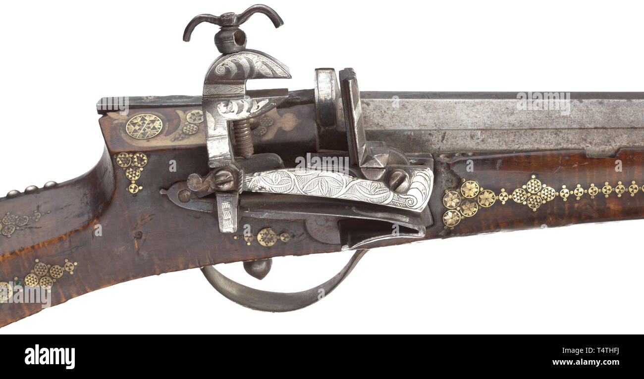 An Ottoman silver inlaid miquelet-lock rifle, mid-18th century ...