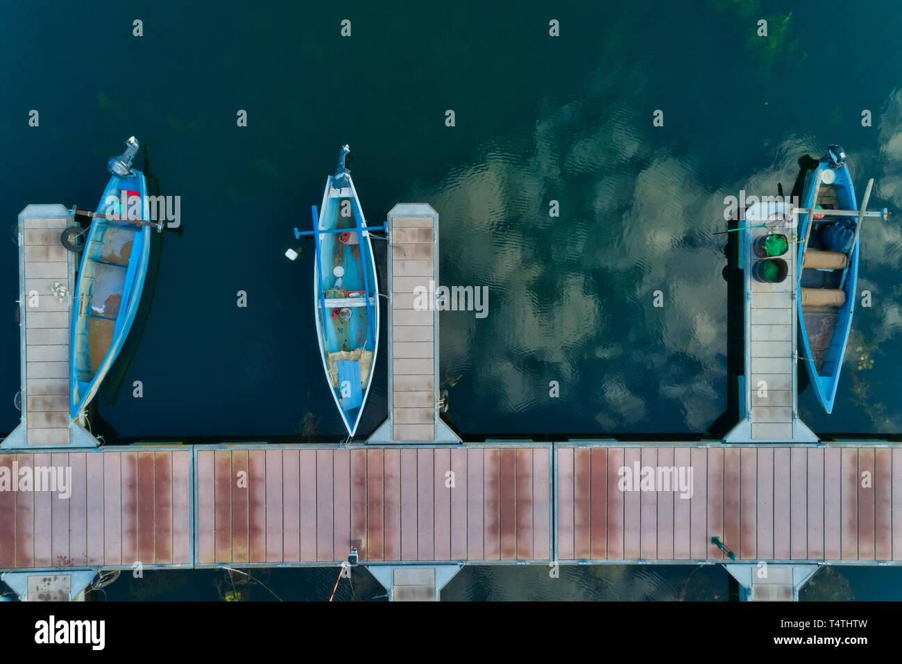 Aerial picture of floating dock with boats, motorboats and vessels ...