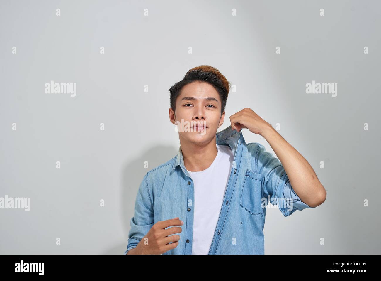 Asian guy posing hi-res stock photography and images - Alamy