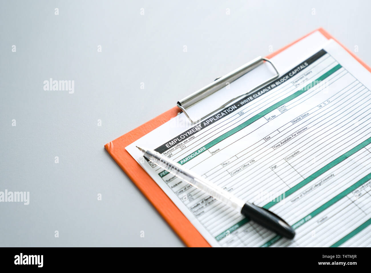Seeking job concept, filling up the information in an employment ...