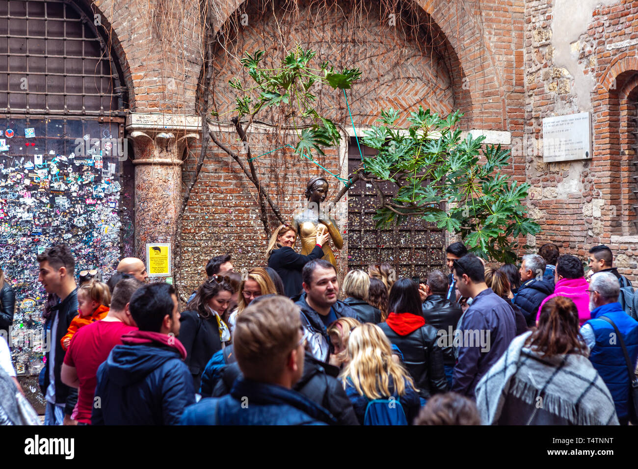 Verona, Italy – March 2019. Statue of Juliet in garden of Gothic-style ...
